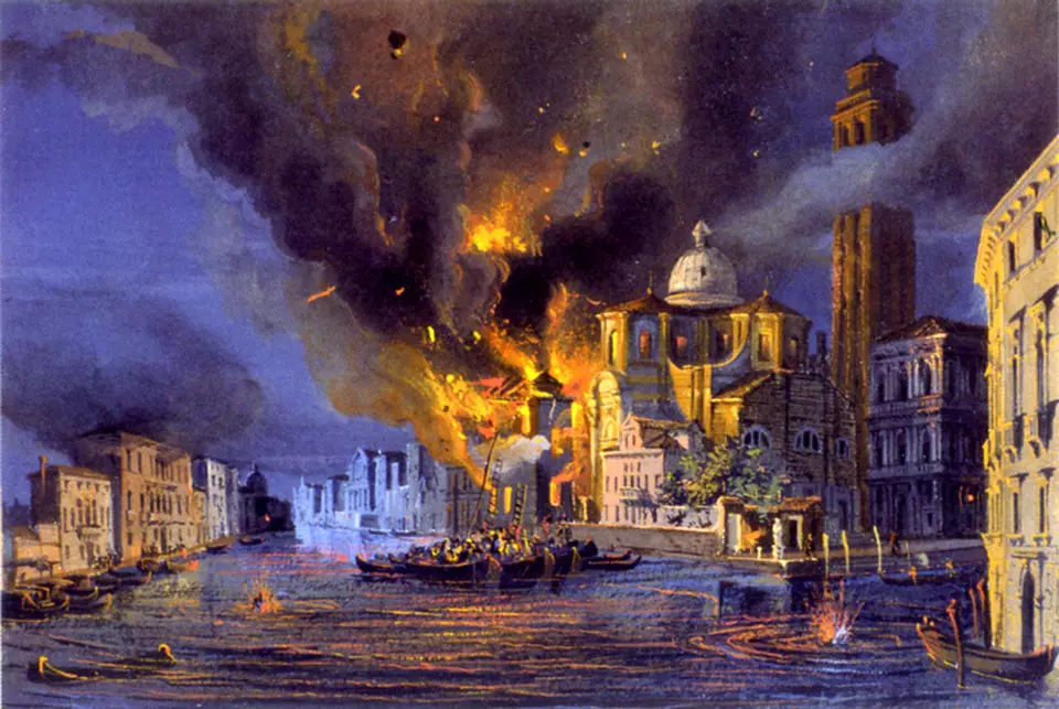 砲撃から生じるヴェネツィアの中心に火