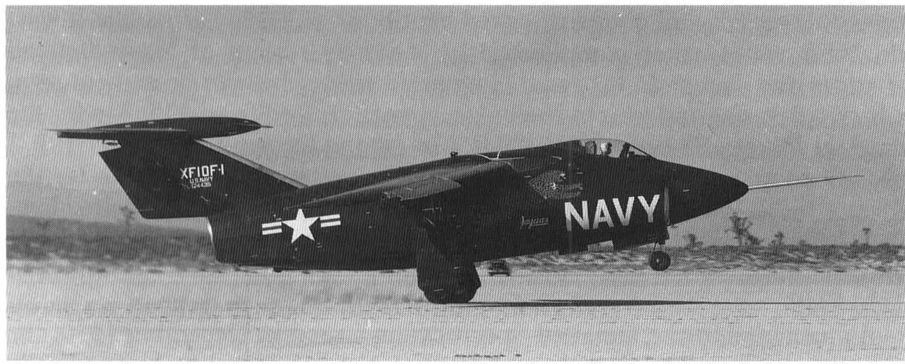 GRUMMAN XF10F-1 Jaguar deck fighter prototype takes off with dry lake Murek, Edwards Air Base, California; May 19, 1952. In the background you can see the Summer Yukki (Grumman)