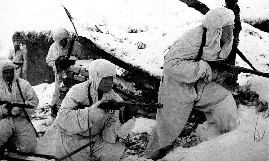 Group of Soviet automatic gunners in winter camouflage coats