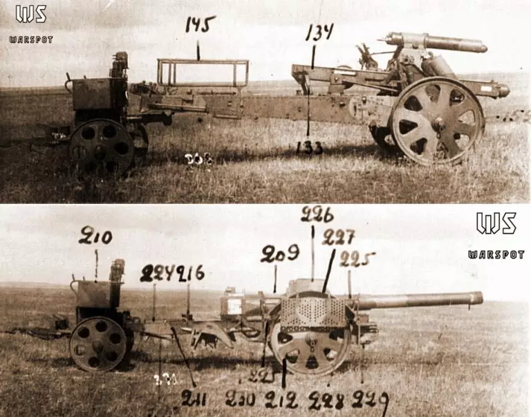 Gaubitiza S.F.H. 18 ot sporti yordamida tashish holatida. Yuqoridan - vagonning tagidan, pastki qismdan - magistrallar. Temir rum bilan metallning g'ildiraklari (TSIMO)