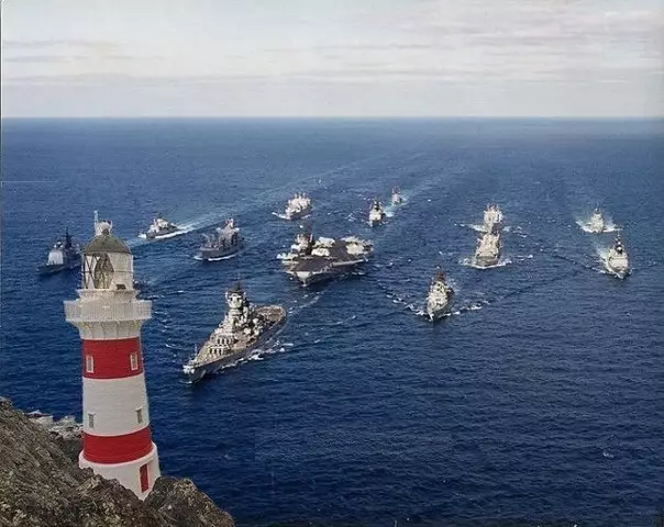 American aircraft carrier and Spanish lighthouse.