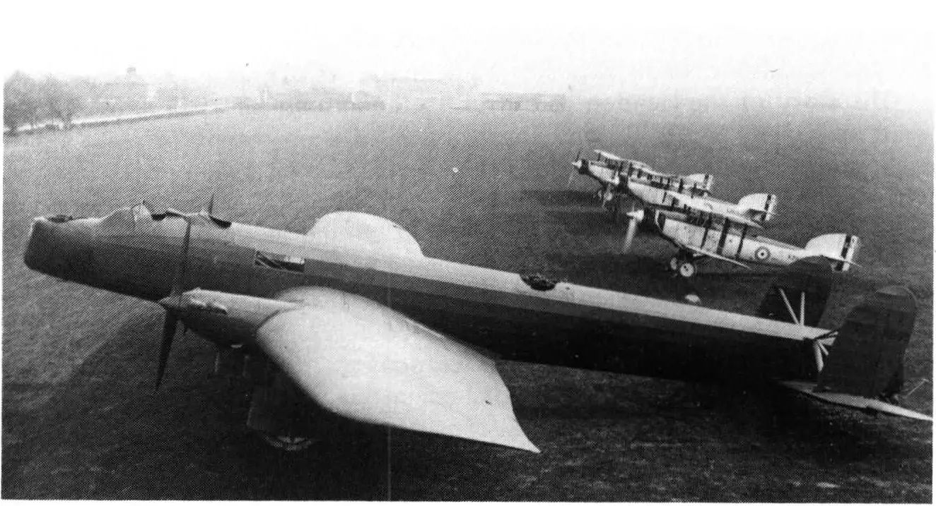 After an accident in March 1931, the K1695 prototype was modified to replace the power plant with Rolls-Royce Kestrel inline engines. The closed cockpit canopy was replaced with windshields for tandem-mounted cockpits. The aircraft behind the tail of the prototype are the Fairey Gordon I light bombers (Courtesy of J. D. Oughton)