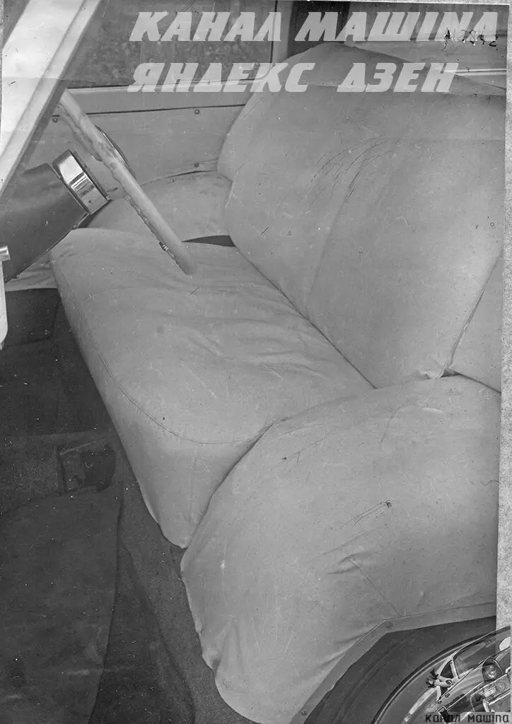 sofa sa drayber ug sa atubangan pasahero nga clamped sa taliwala sa mga ligid nga kahaligian